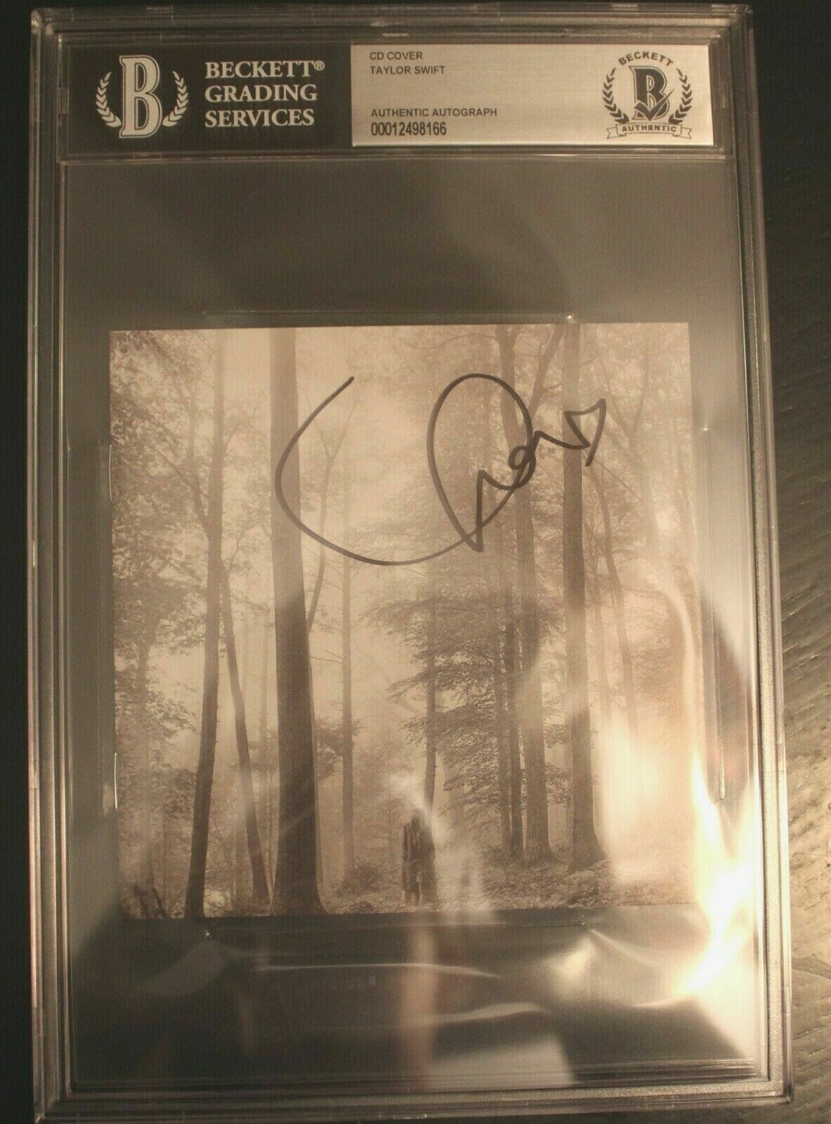 Taylor Swift Signed Folklore CD Cover w/Beckett BAS COA Slab Slabbed ...