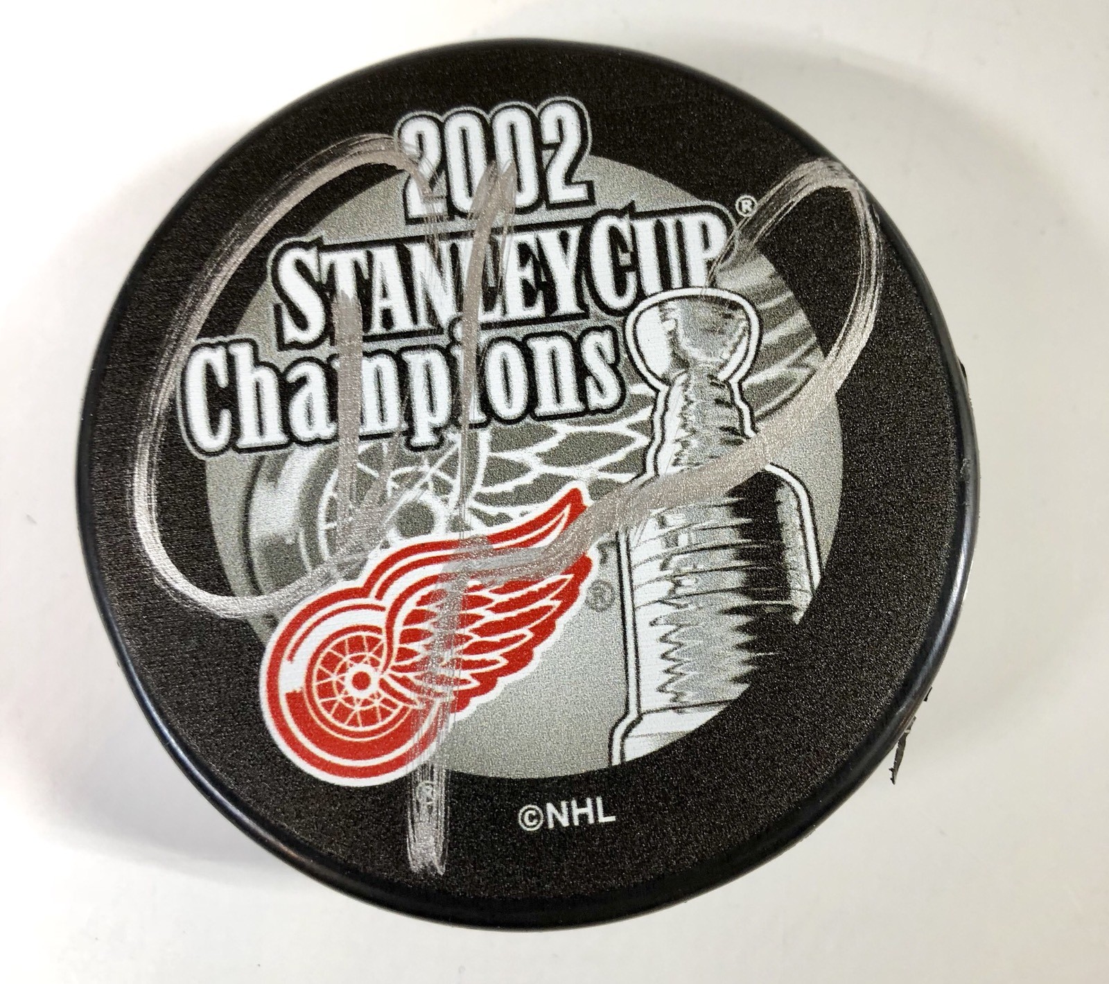 Igor Larionov Signed Detroit Red Wings 2002 Stanley Cup Champions Puck | Autographia