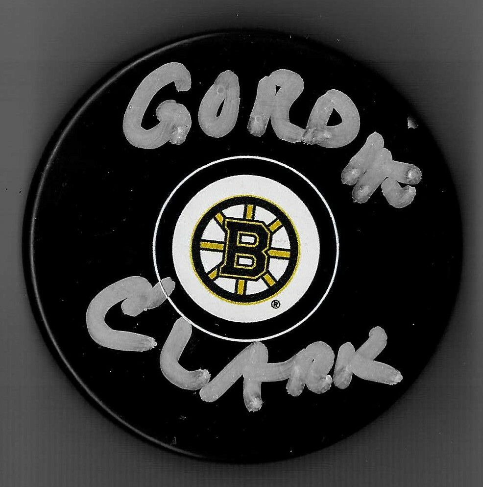Gordie Clark Signed Boston Bruins Puck | Autographia
