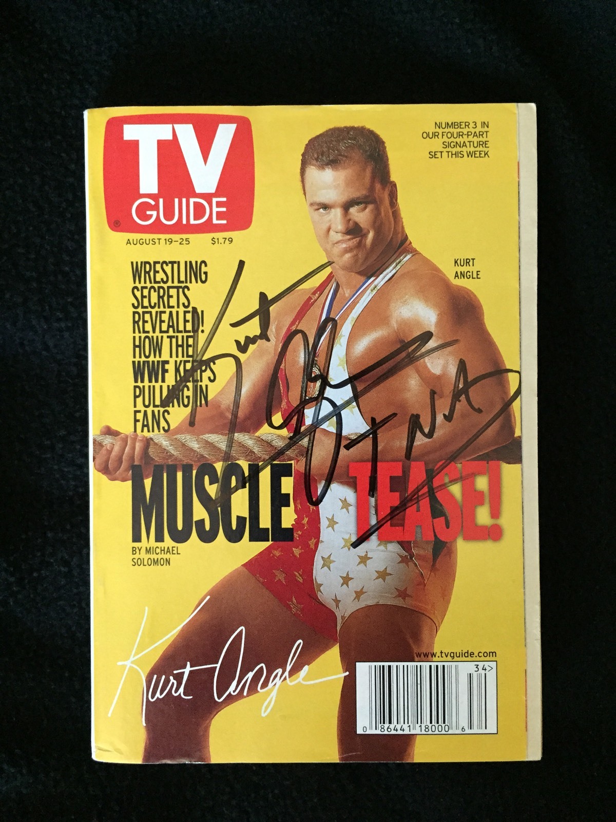KURT ANGLE SIGNED WWE MUSCLE TEASE TV GUIDE | Autographia