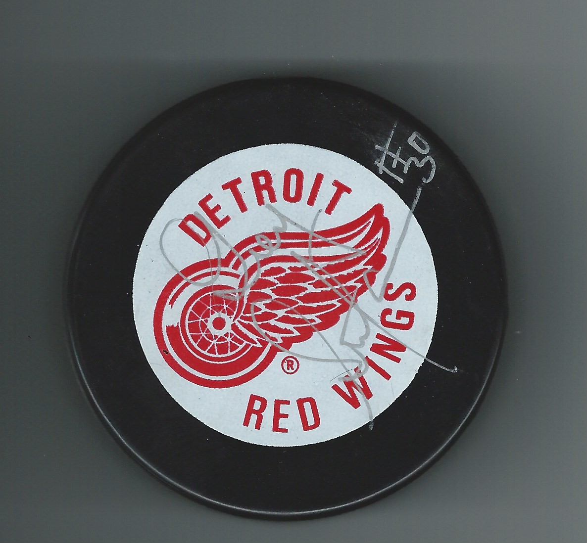 Greg Stefan Signed Detroit Red Wings 1980s Puck | Autographia