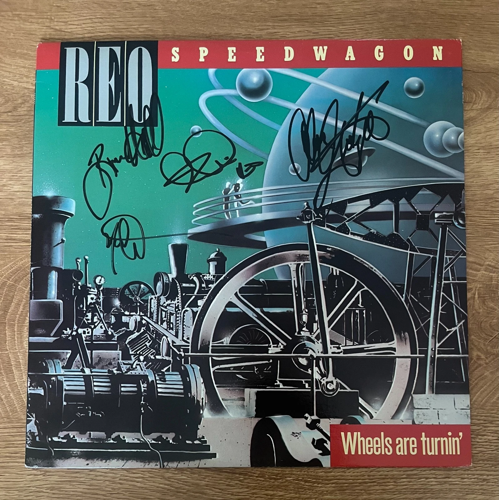 * REO SPEEDWAGON * signed album * WHEELS ARE TURNIN' * KEVIN CRONIN ...